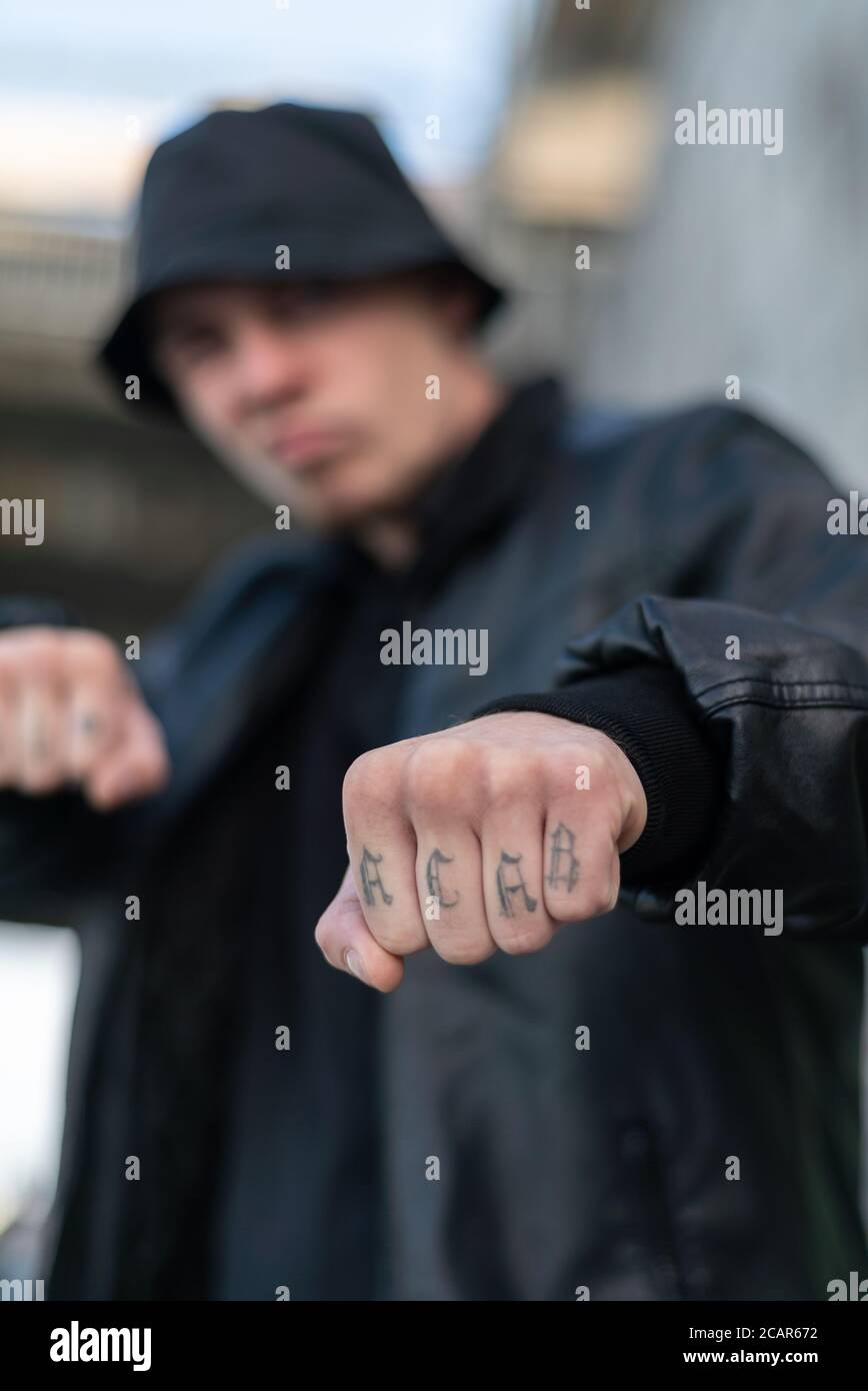 ACAB tattoo on the arm of a bully man Stock Photo - Alamy