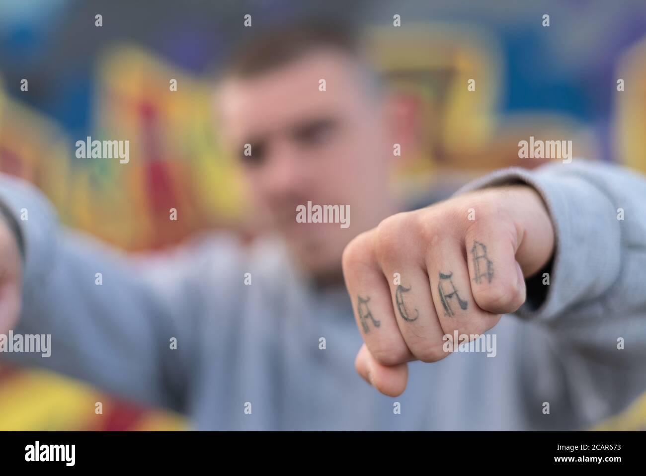ACAB tattoo on the arm of a bully man Stock Photo - Alamy