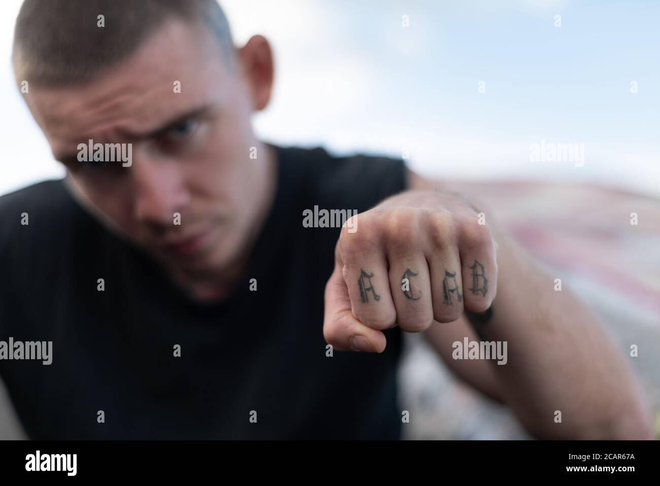 ACAB tattoo on the arm of a bully man Stock Photo - Alamy