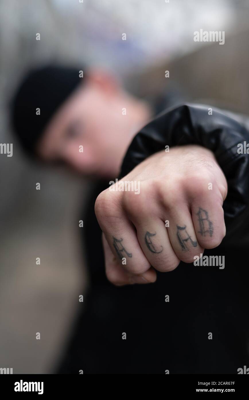 ACAB tattoo on the arm of a bully man Stock Photo - Alamy