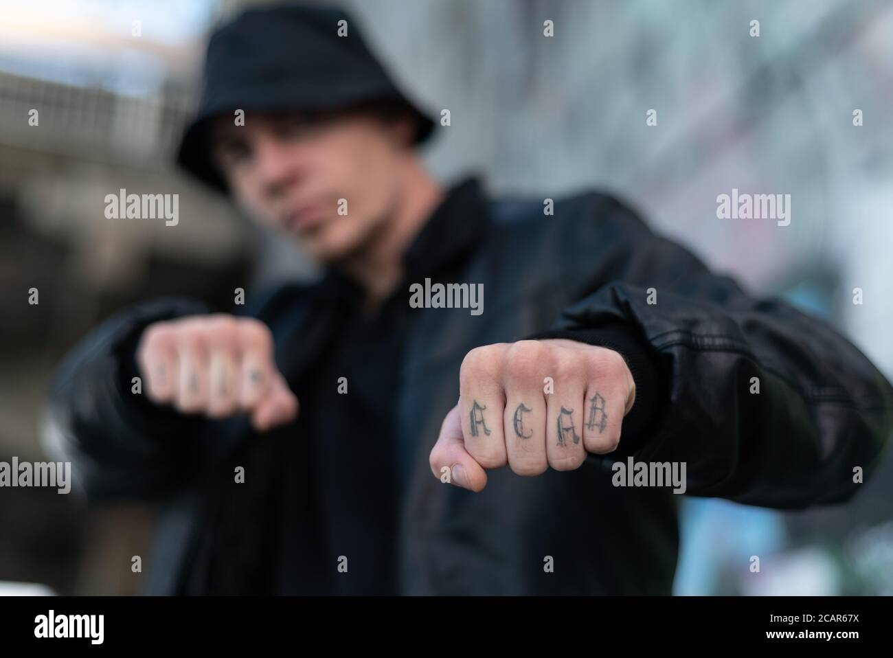 ACAB tattoo on the arm of a bully man Stock Photo - Alamy