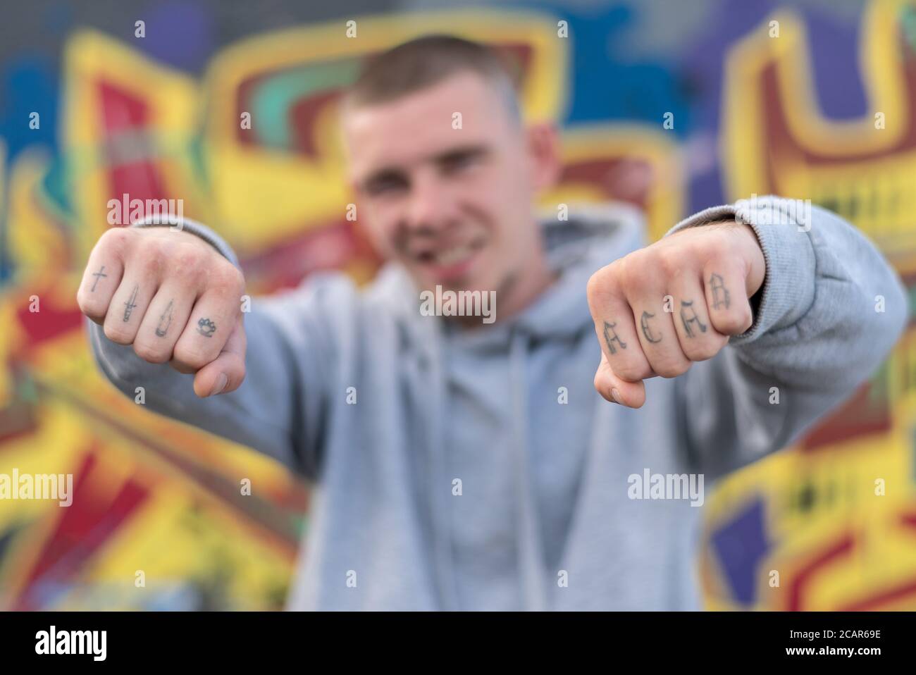ACAB tattoo on the arm of a bully man Stock Photo - Alamy