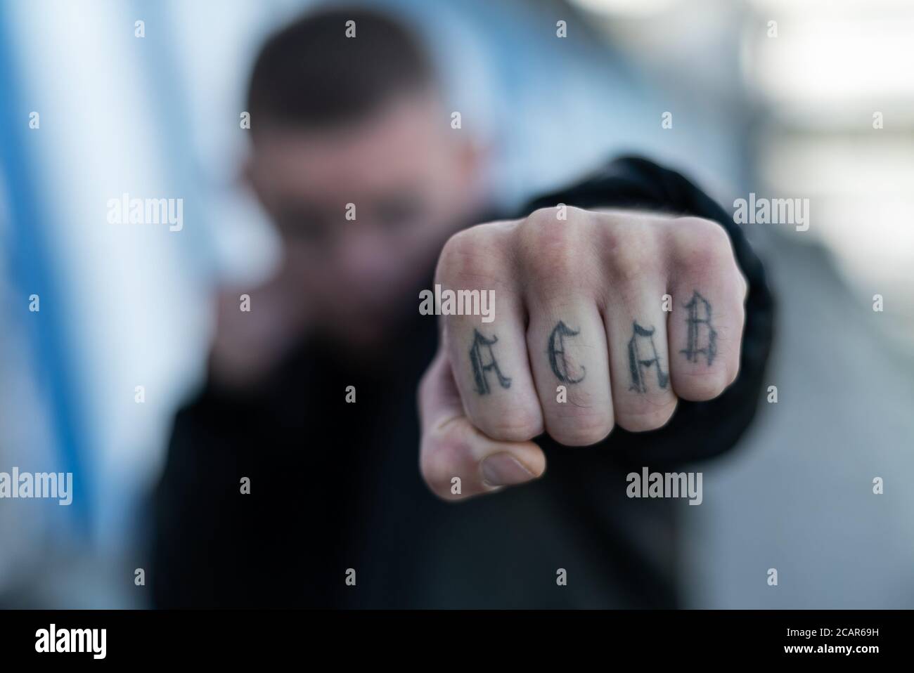 ACAB tattoo on the arm of a bully man Stock Photo - Alamy