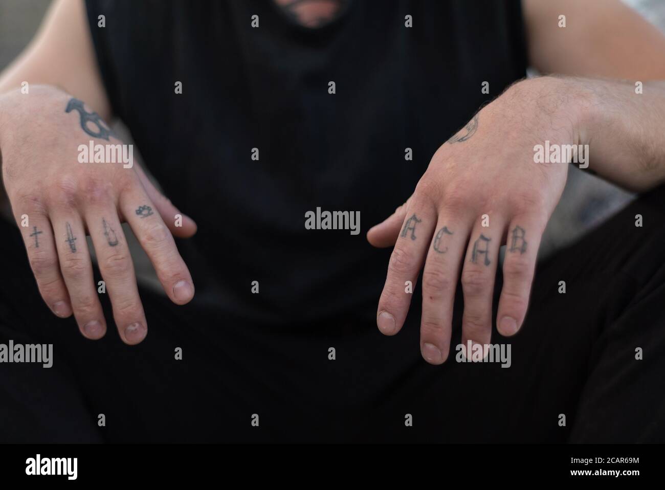 ACAB tattoo on the arm of a bully man Stock Photo - Alamy