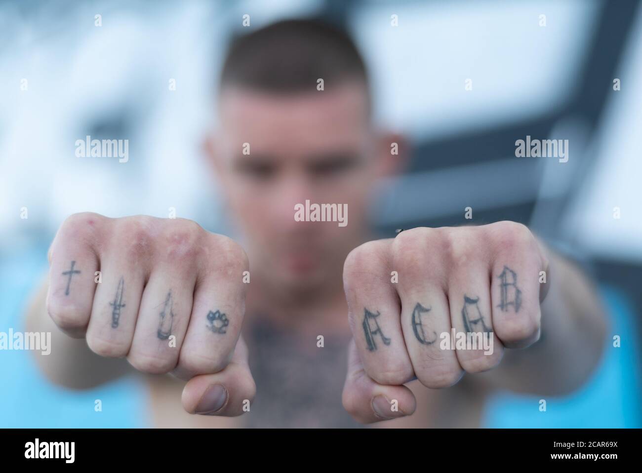 ACAB tattoo on the arm of a bully man Stock Photo - Alamy