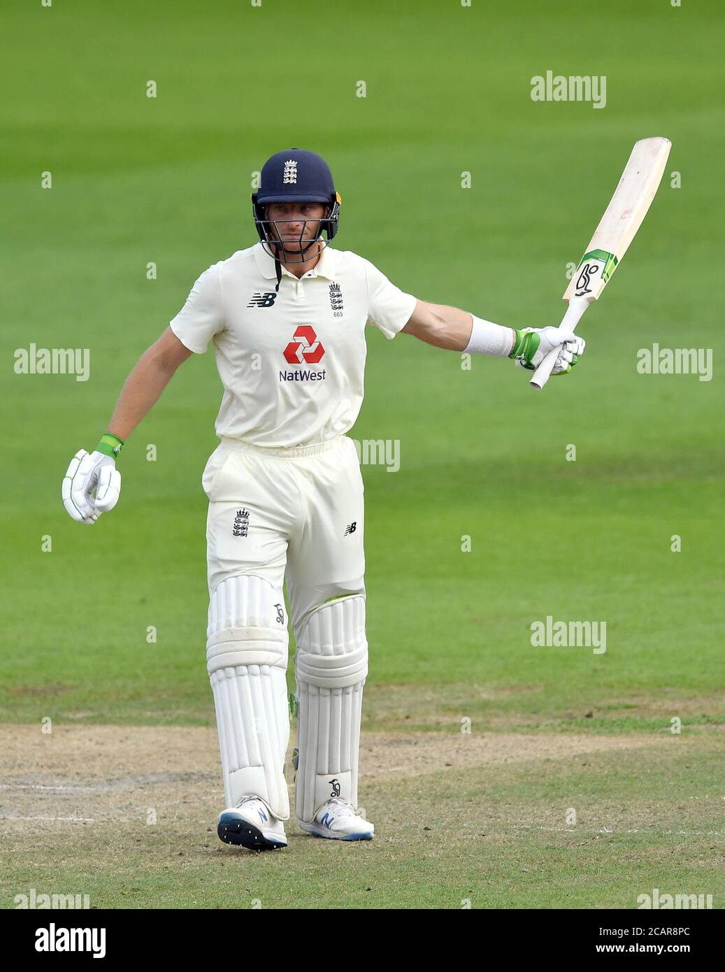 England's Jos Buttler celebrates reaching his half century during day ...