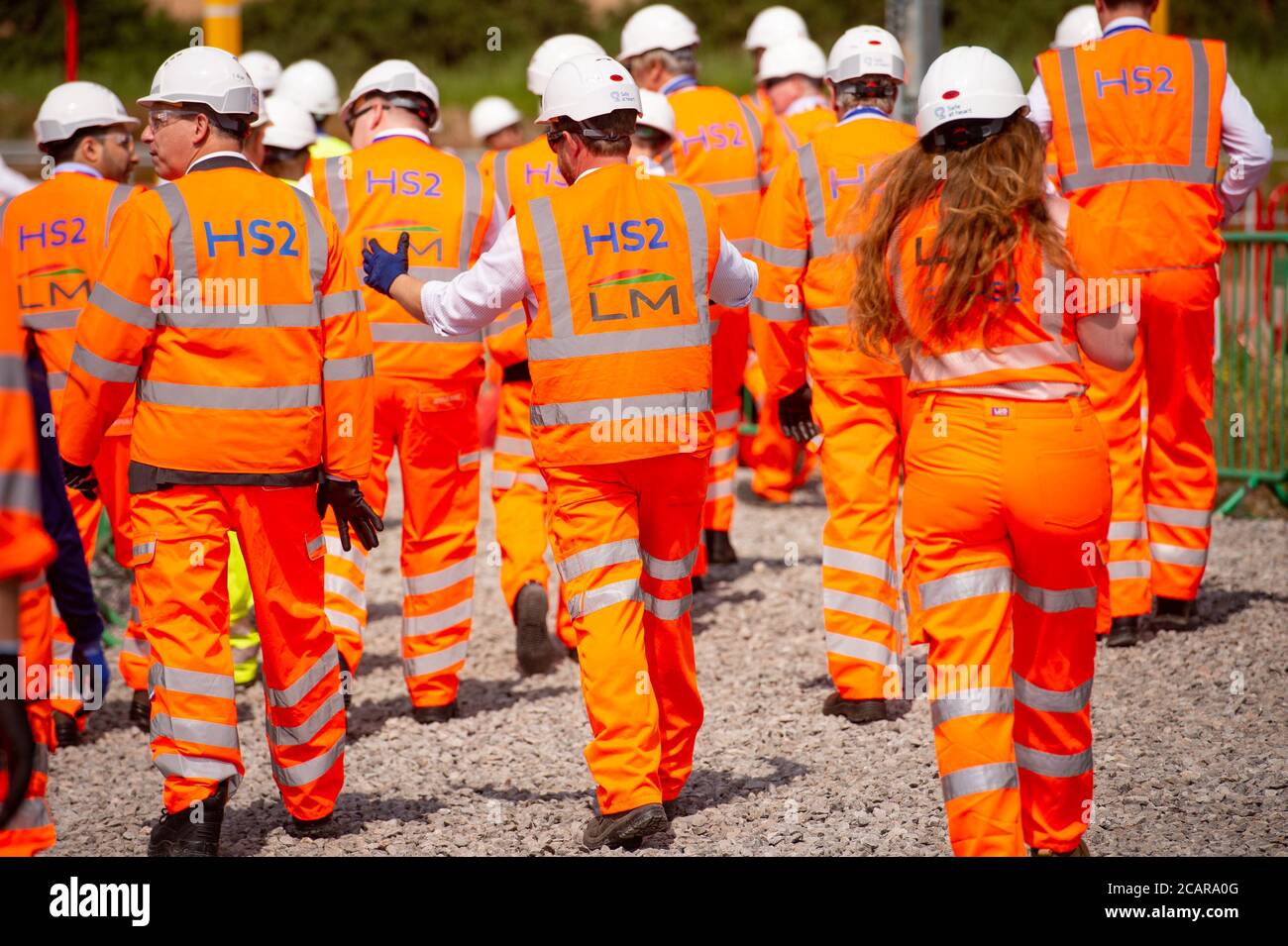 HS2 workers prepare to watch as a bridge is wheeled into position over ...