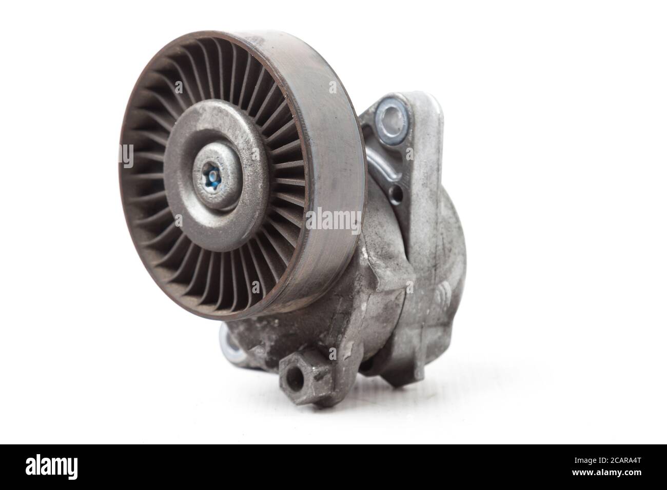 V-belt tensioner for attachments of an internal combustion engine of a ...