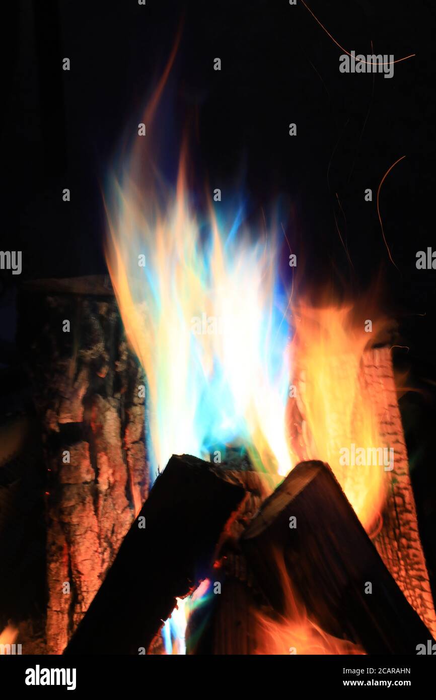 Backyard Fire ring with a Colorful burning fames Stock Photo - Alamy