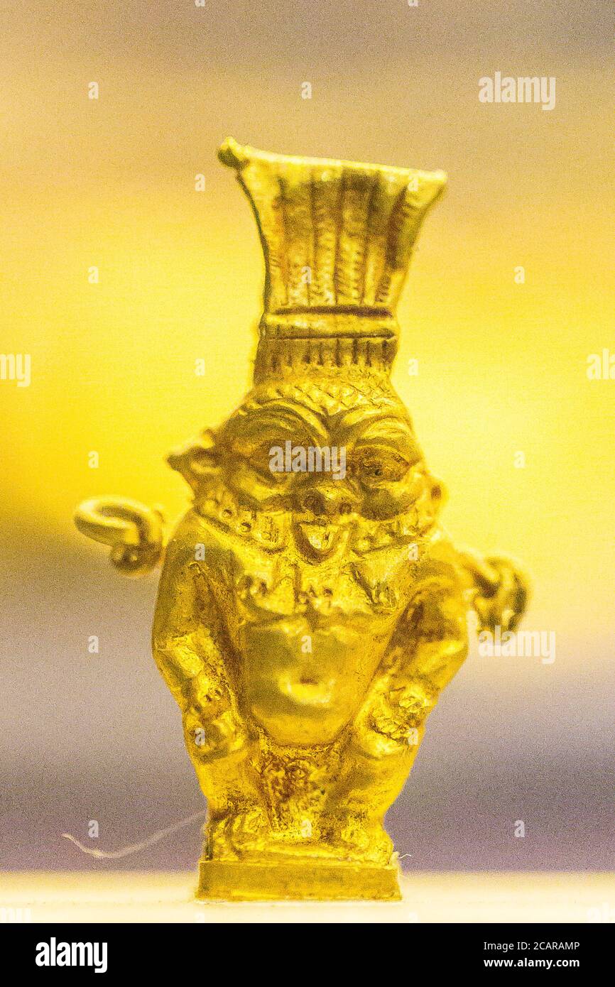 Egypt, Cairo, Egyptian Museum, gold statuette of the god Bes Stock ...