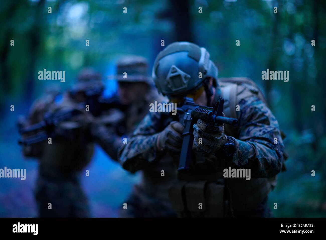Modern warfare Soldiers Squad Running as Team in Battle Formation Stock ...