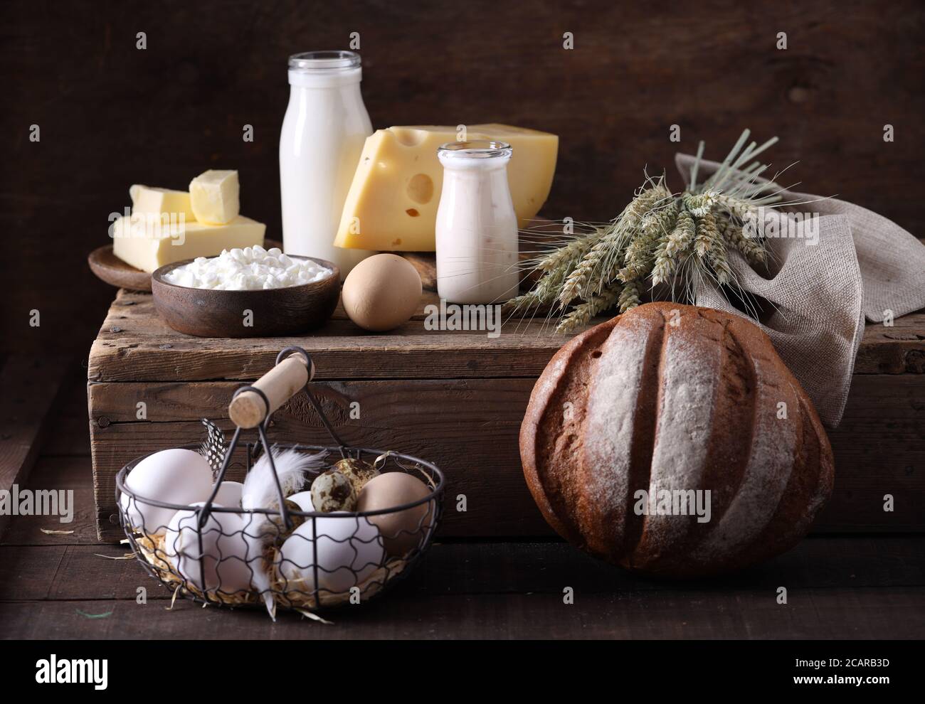 dairy products assortment on wooden board Stock Photo - Alamy