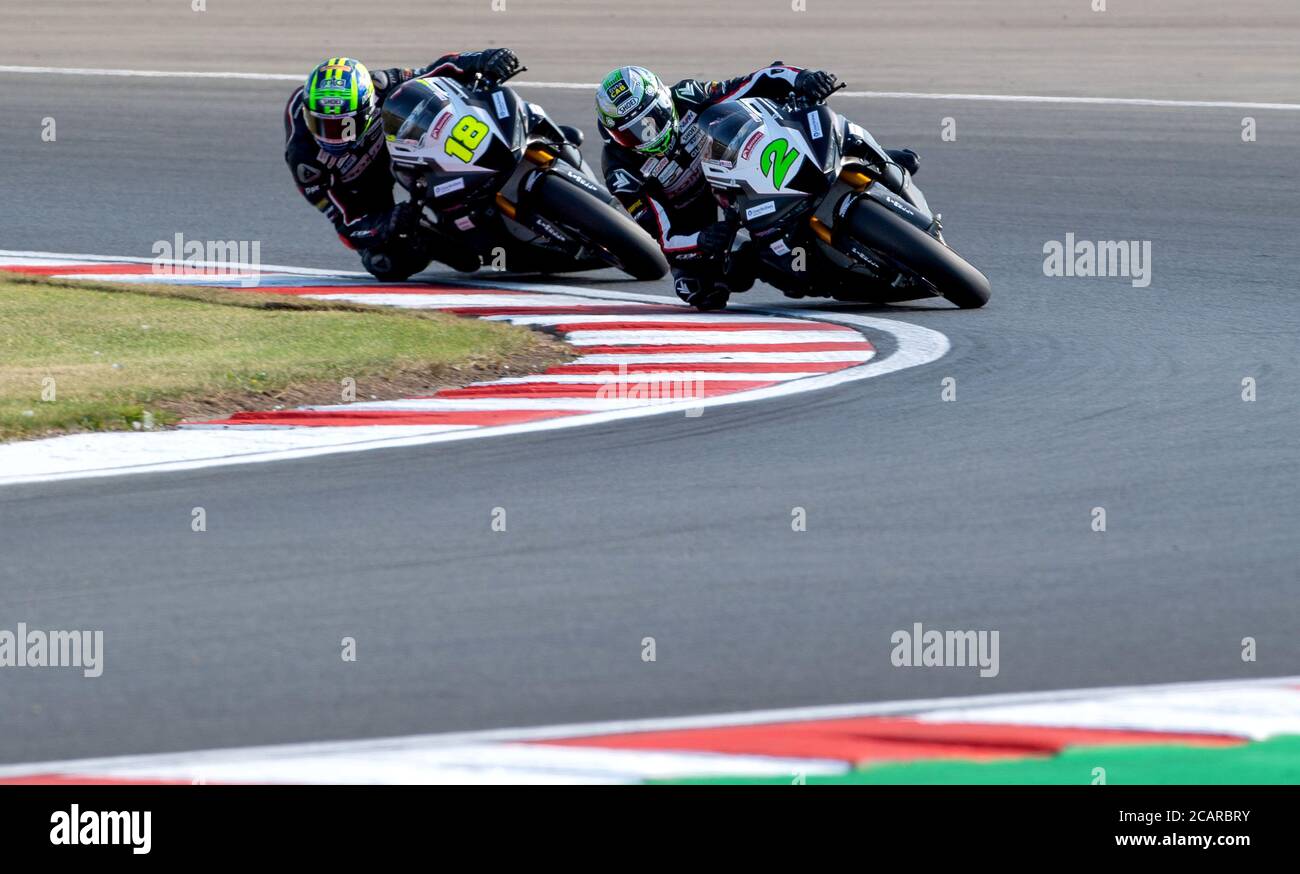 Honda Racing's Andrew Irwin (left) battles for pole position with his ...