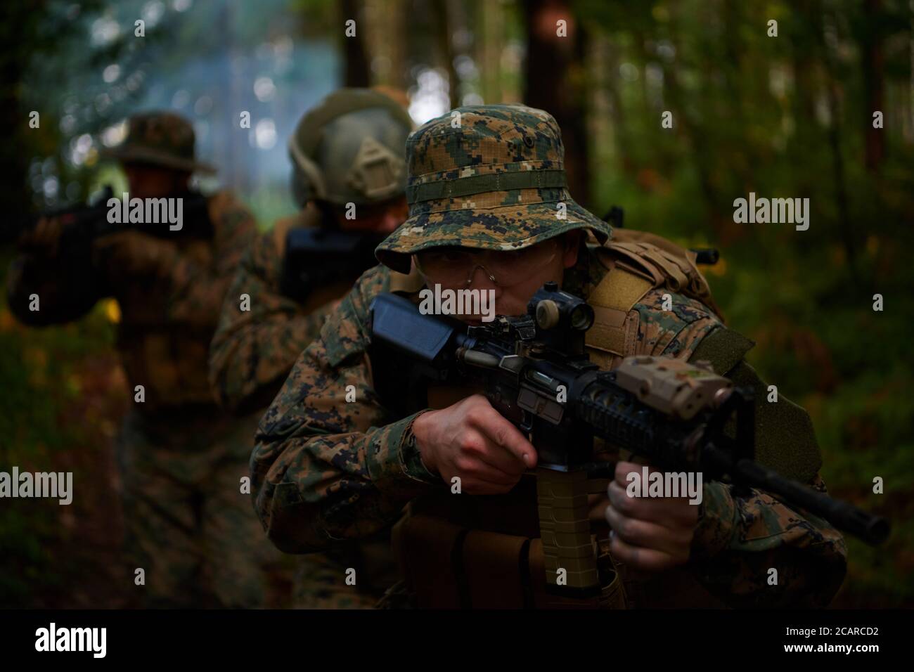 Modern warfare Soldiers Squad Running as Team in Battle Formation Stock ...