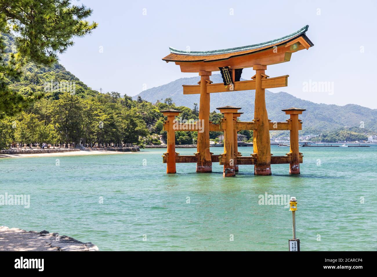 Heron in front of the Floating Tori Gate, Japan Stock Photo - Alamy
