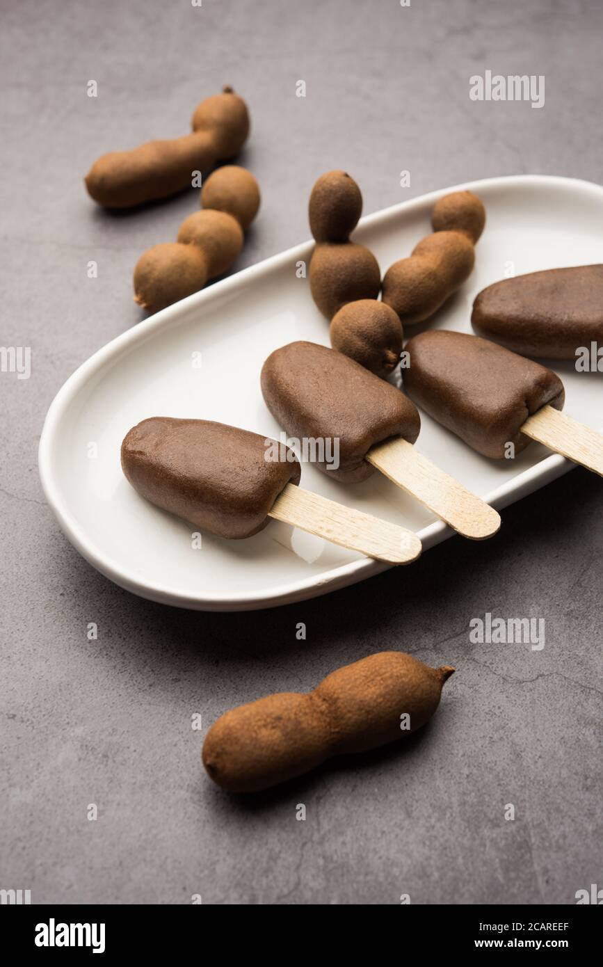 Imli stick Candy or Tamarind Lollipop is kids favourite sweet food in ...