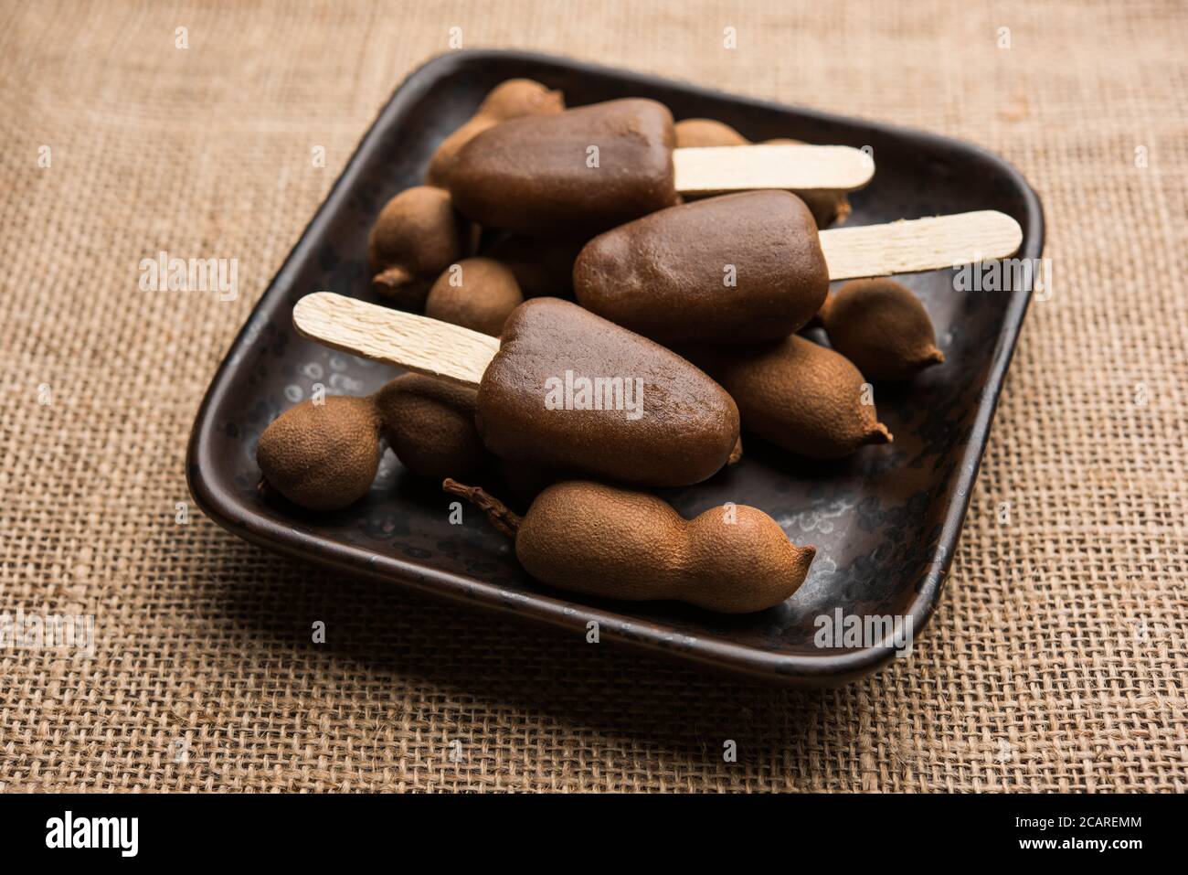 Imli stick Candy or Tamarind Lollipop is kids favourite sweet food in ...