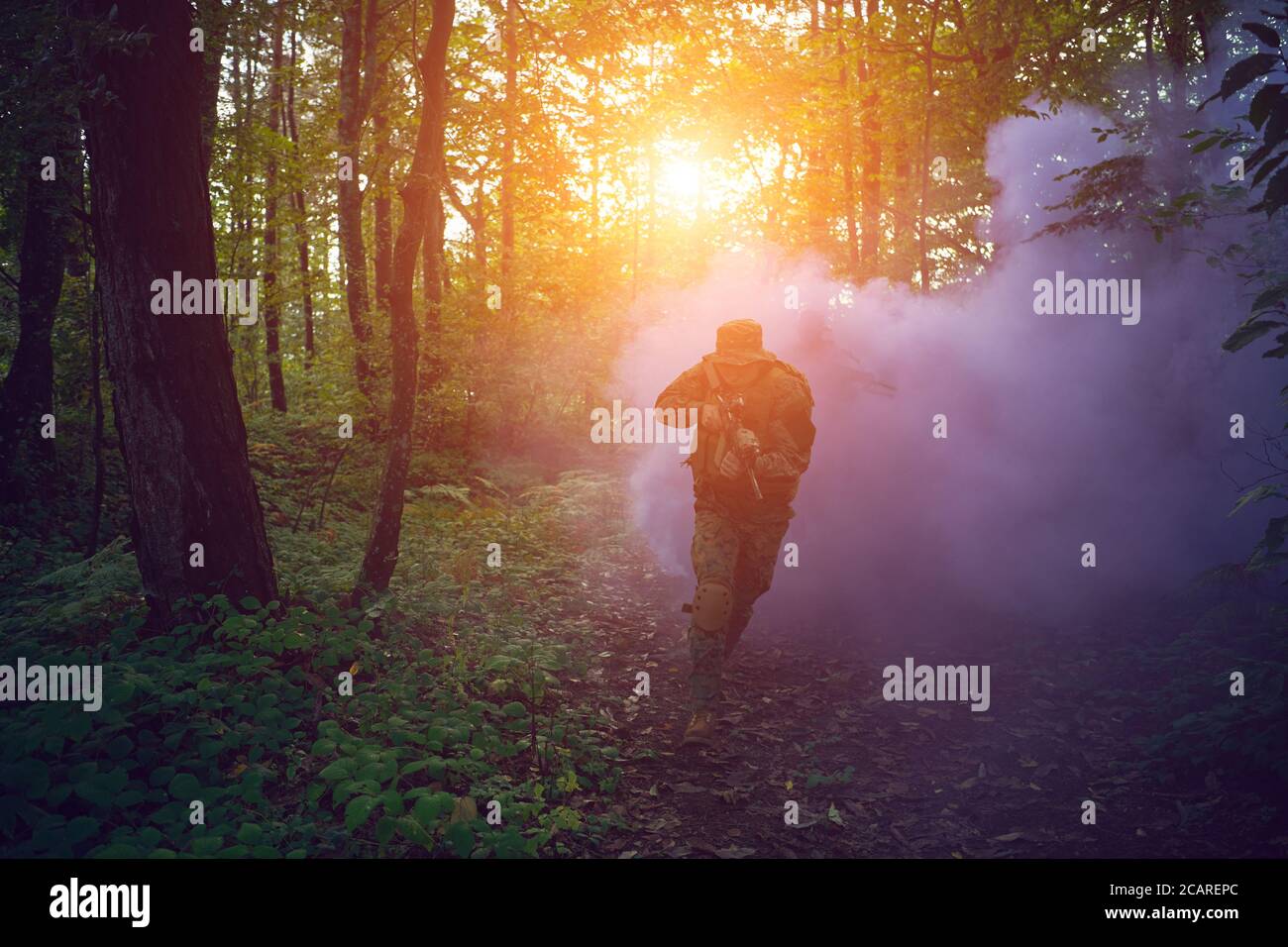 Modern warfare Soldiers Squad in Battle Formation Stock Photo - Alamy