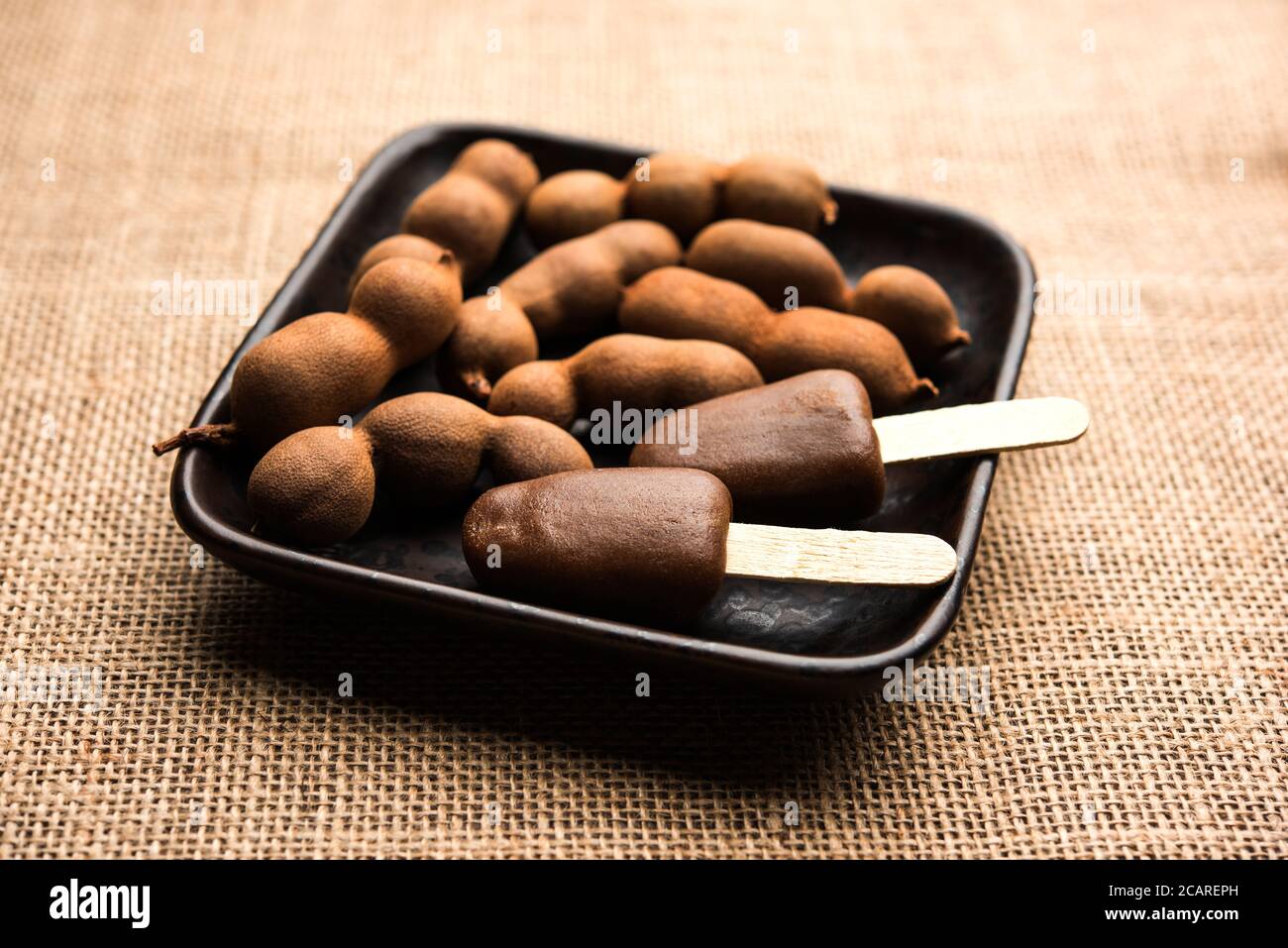 Imli stick Candy or Tamarind Lollipop is kids favourite sweet food in ...