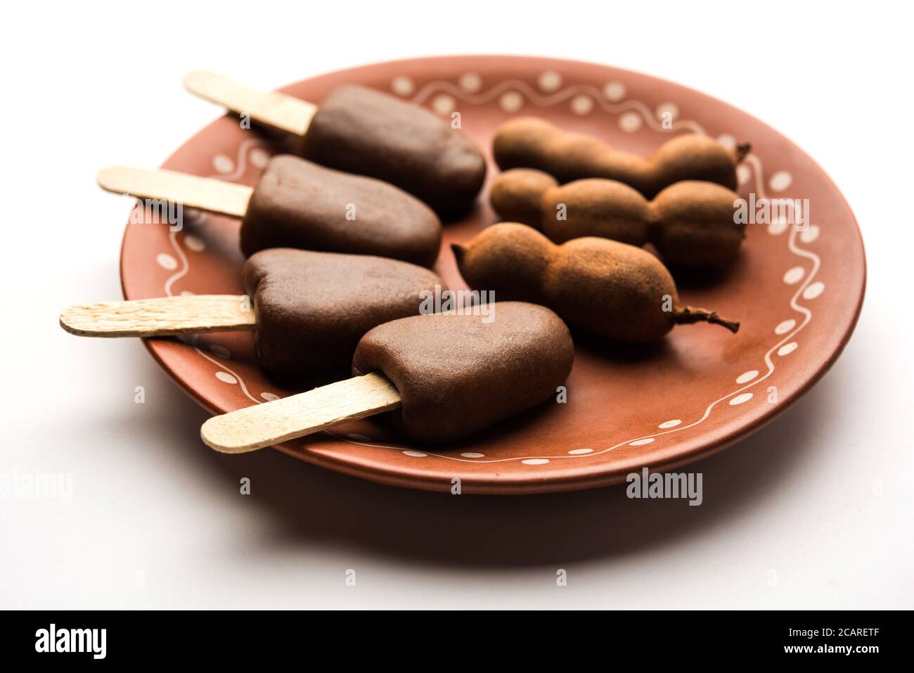 Imli stick Candy or Tamarind Lollipop is kids favourite sweet food in ...