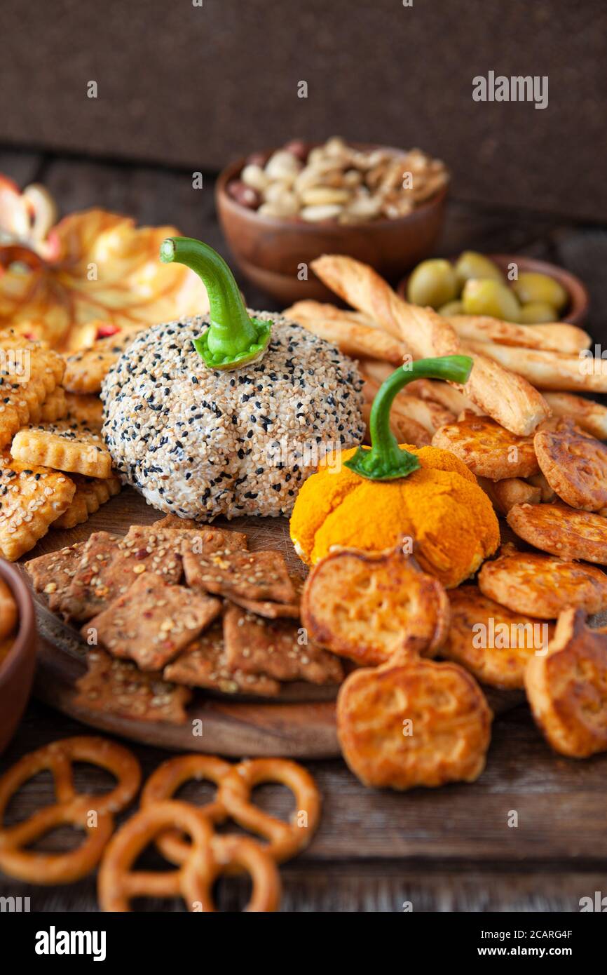 Cheese platter with cream cheese, crackers and nuts Stock Photo - Alamy