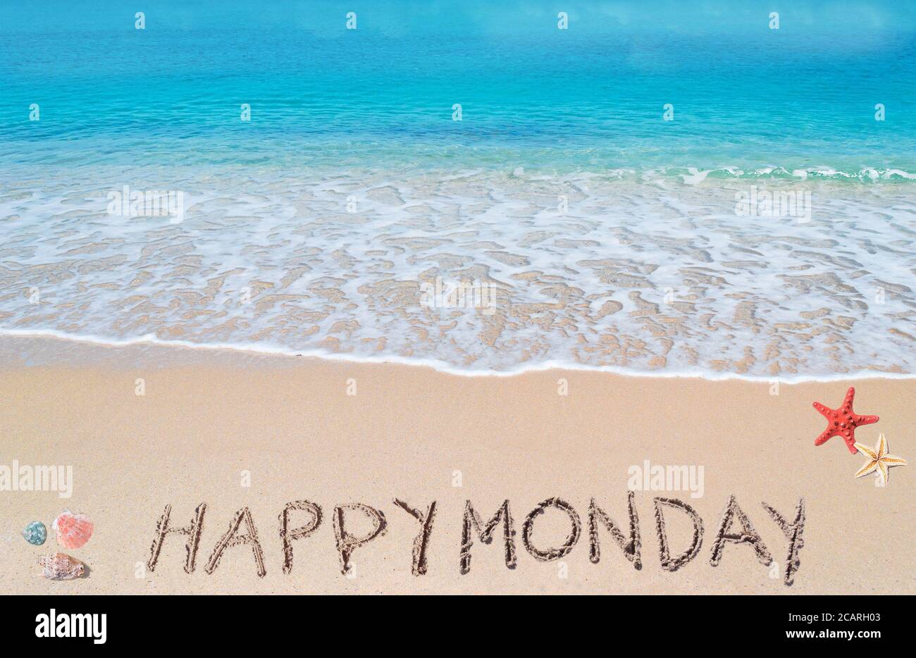 happy monday written on a tropical beach Stock Photo - Alamy