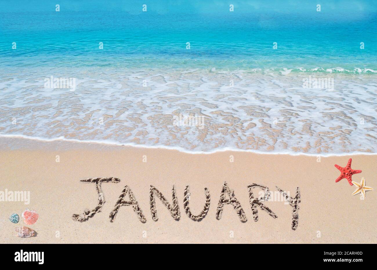 january written on a tropical beach Stock Photo - Alamy