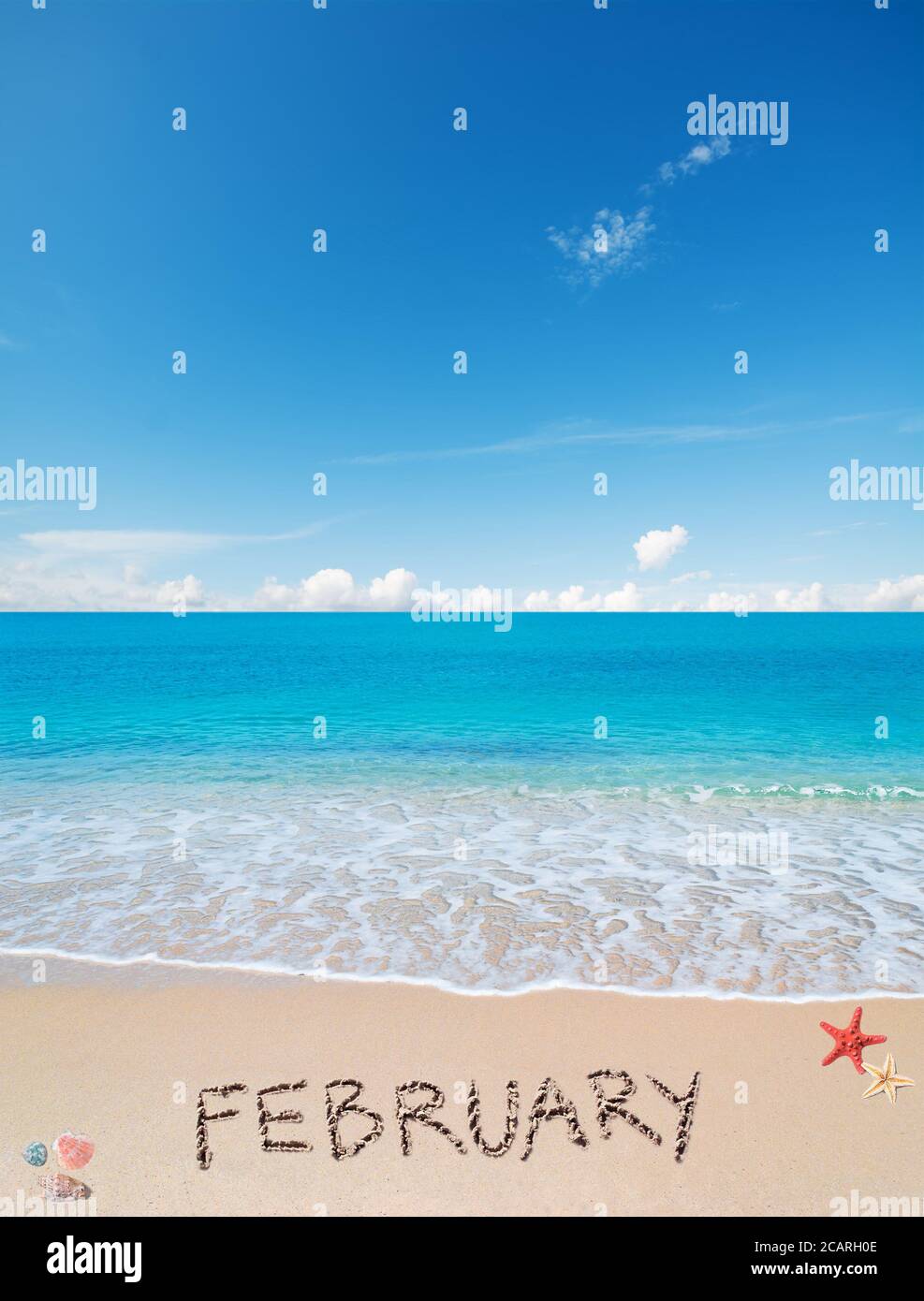 february written on a tropical beach Stock Photo - Alamy