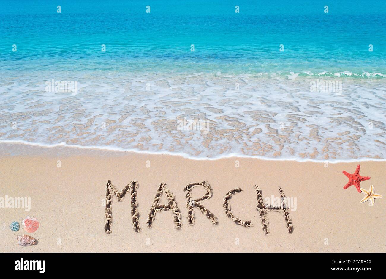 march written on a tropical beach Stock Photo - Alamy
