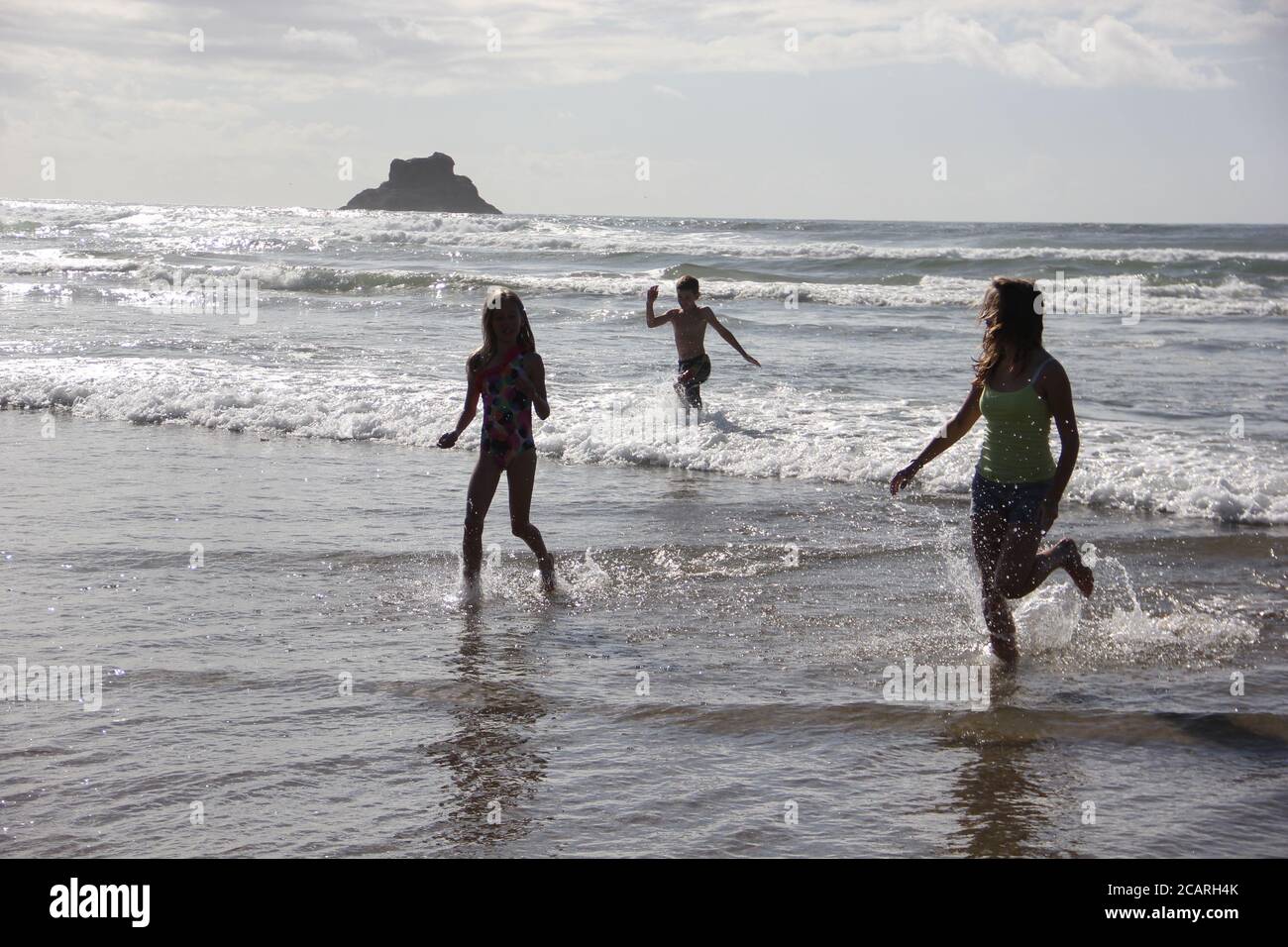 Man jumping rock coast hi-res stock photography and images - Alamy