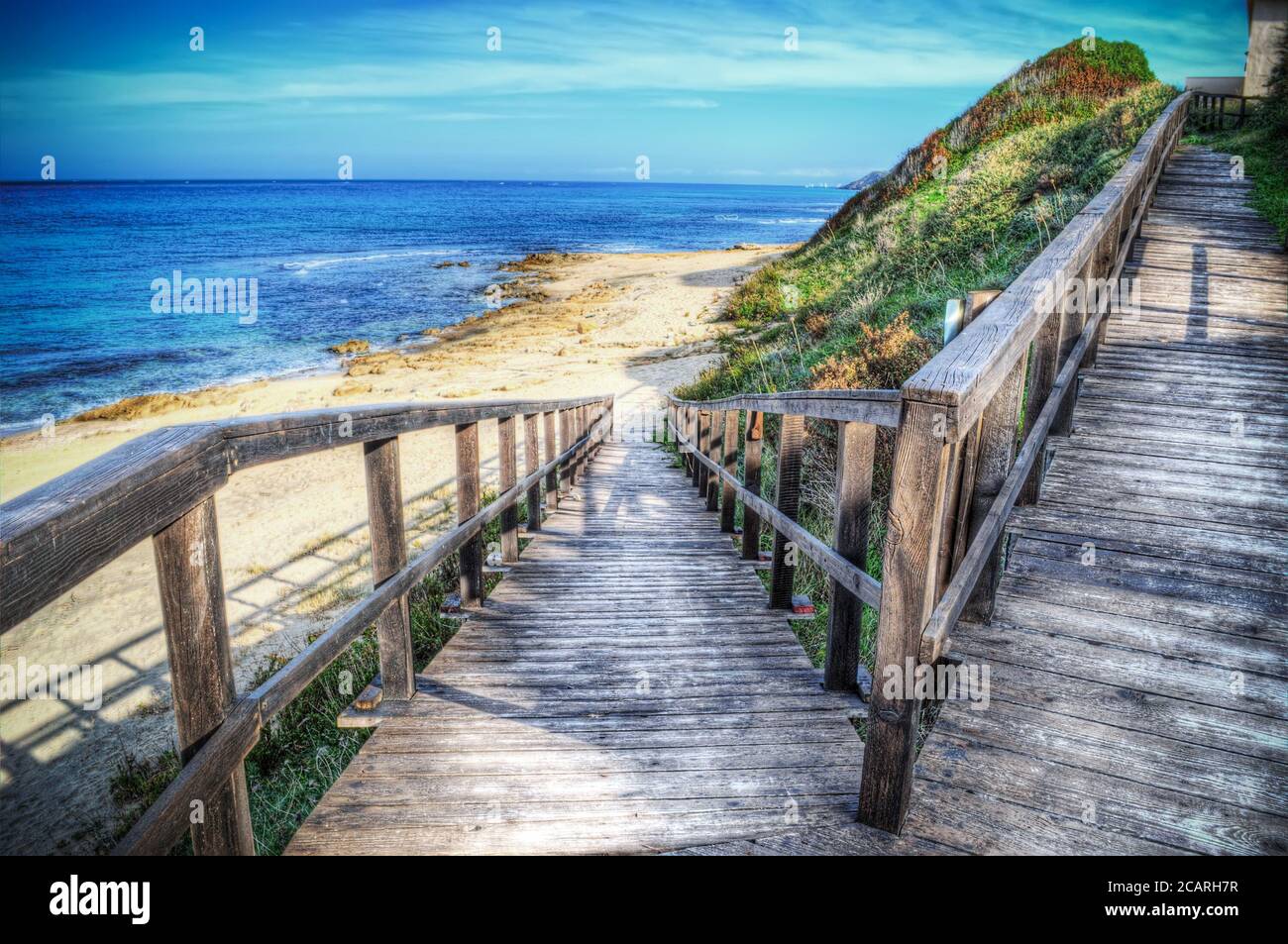 wooden ramp to the beach. Processed for hdr tone mapping effect Stock ...