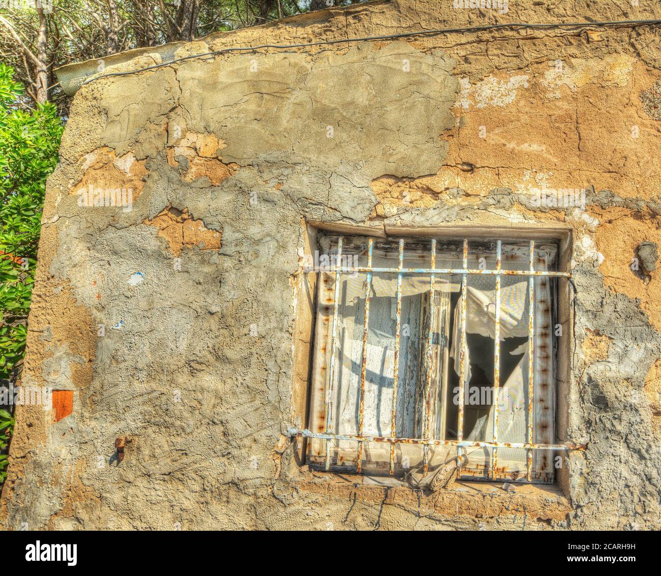 rustic window in an old house in the forest. Processed for hdr tone ...