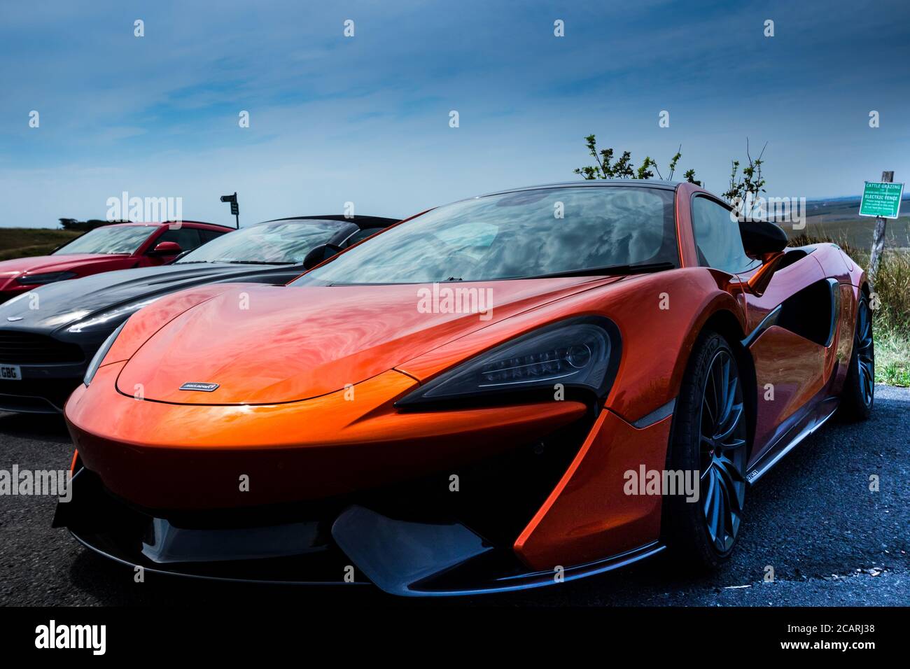 Super car owners meet on the South Downs to enjoy their vehicles Stock ...