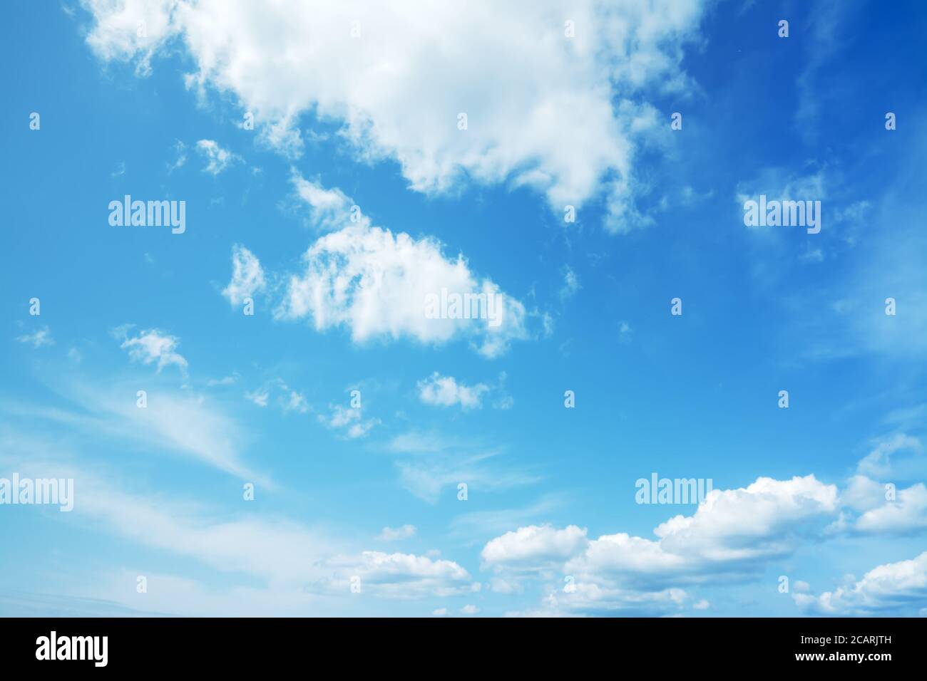 blue sky with white, soft clouds Stock Photo - Alamy
