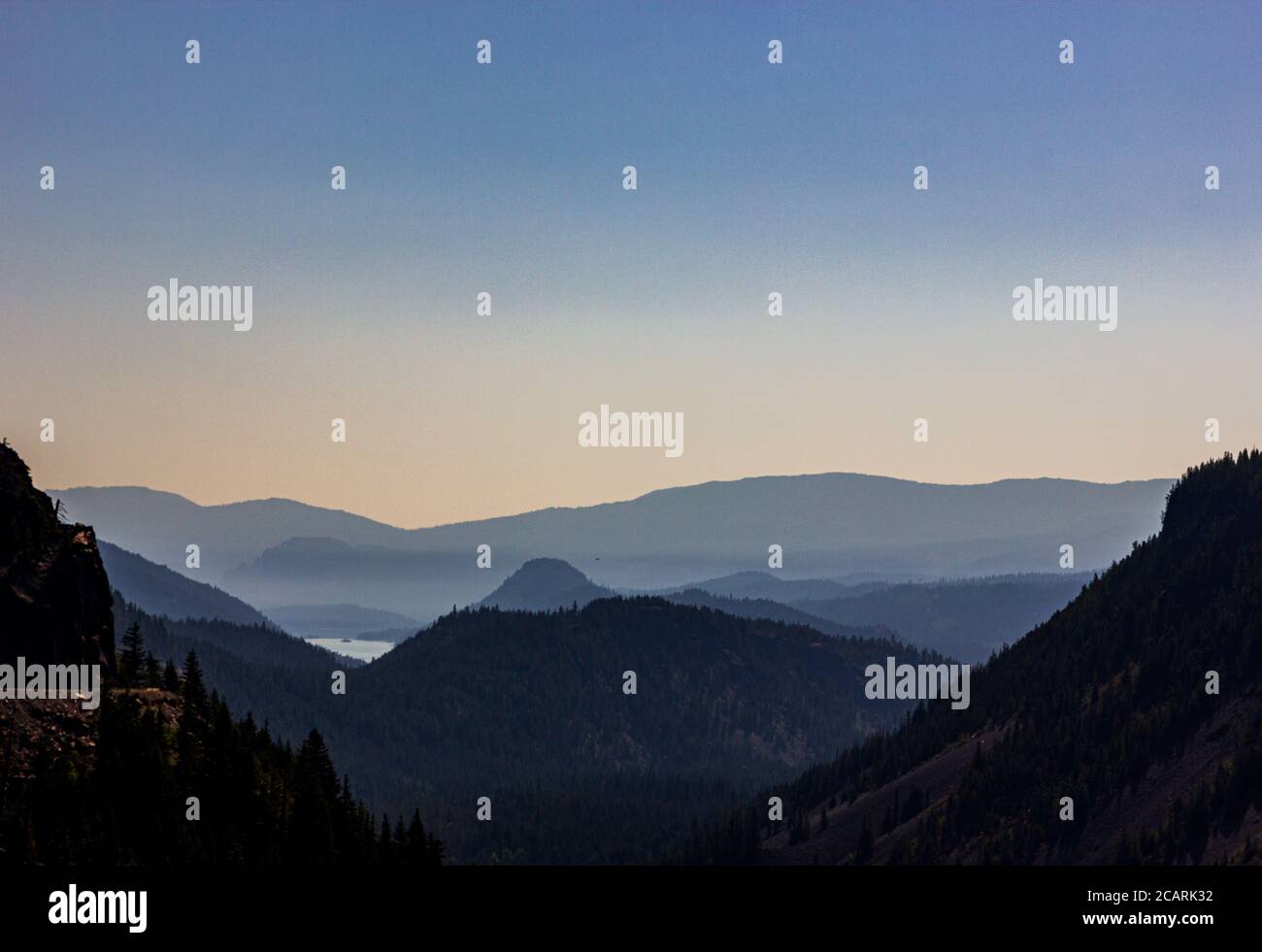 Eastern view of shadowy mountains overlooking Rimrock Lake from Clear ...