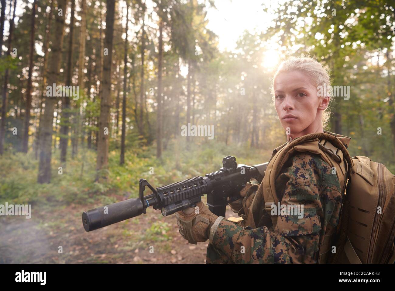 Beautiful woman soldier sniper rifle hi-res stock photography and ...