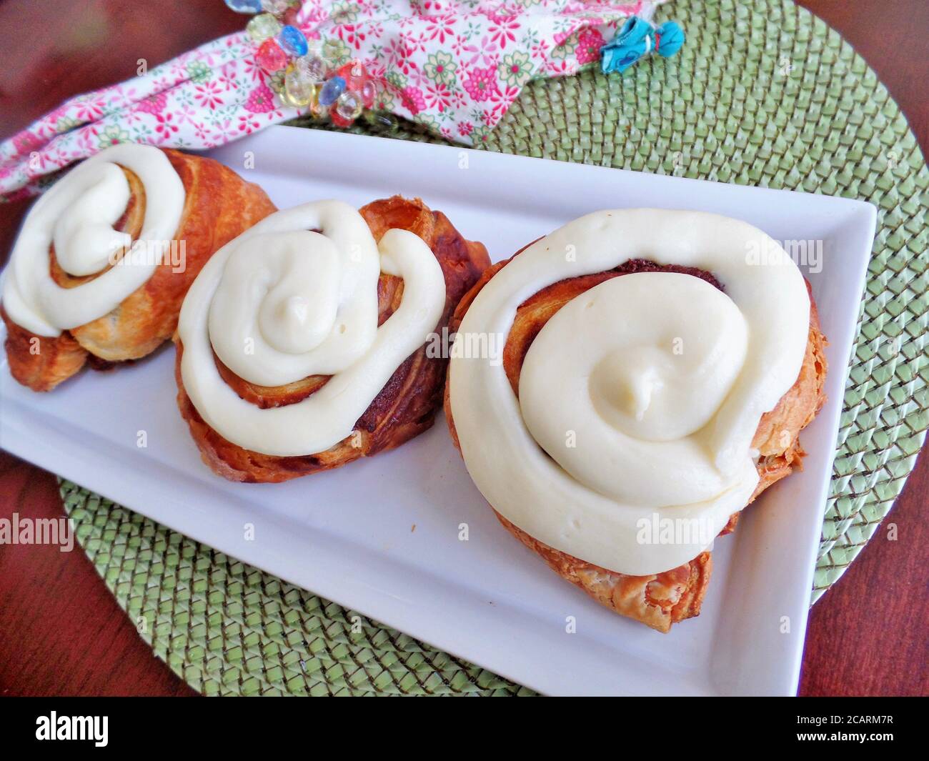 Cinnamon buns with cream cheese icing Stock Photo - Alamy