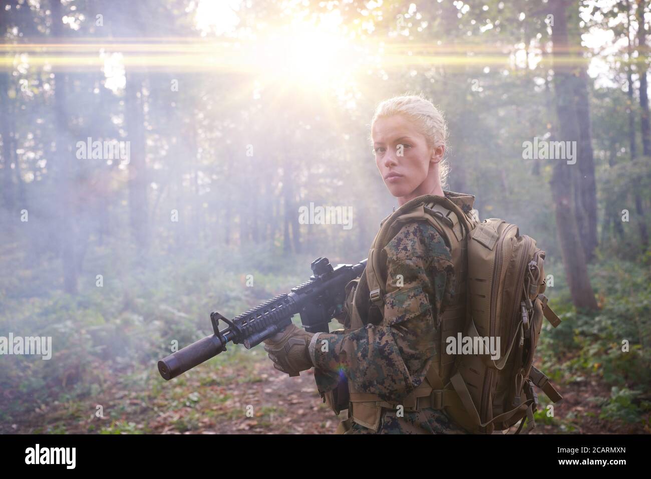 woman soldier ready for battle wearing protective military gear and ...
