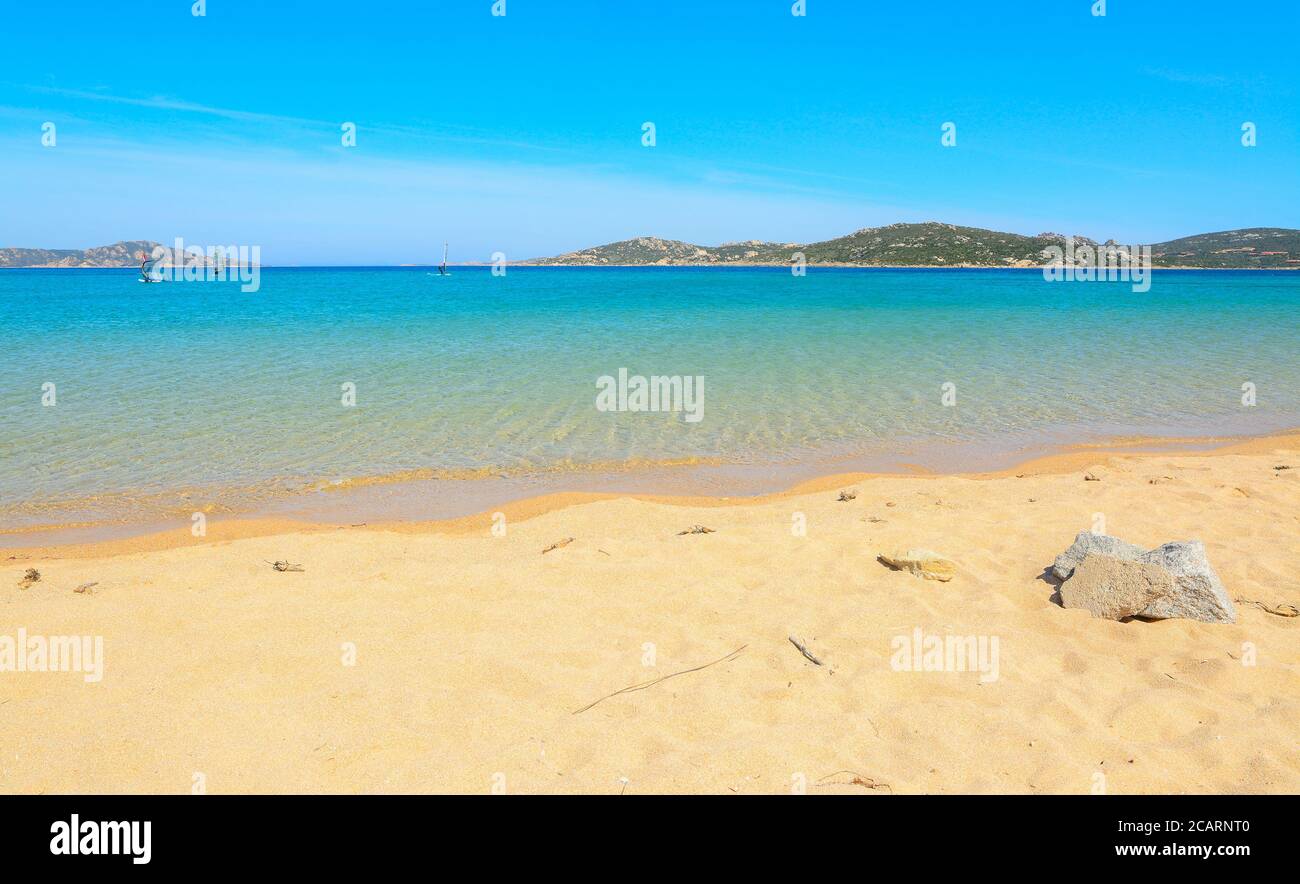 windsurfing in Porto Pollo beach, Sardinia Stock Photo - Alamy