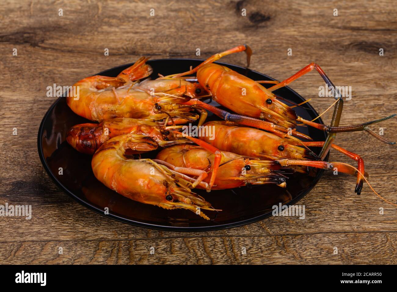 Grilled Asian water prawn in the plate Stock Photo - Alamy
