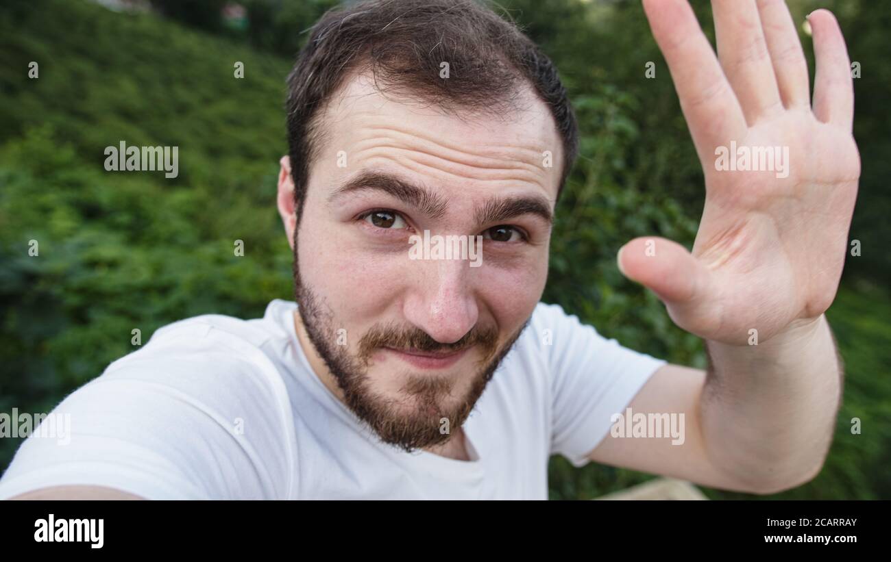 White skin man talking video on phone in nature Life style concept ...