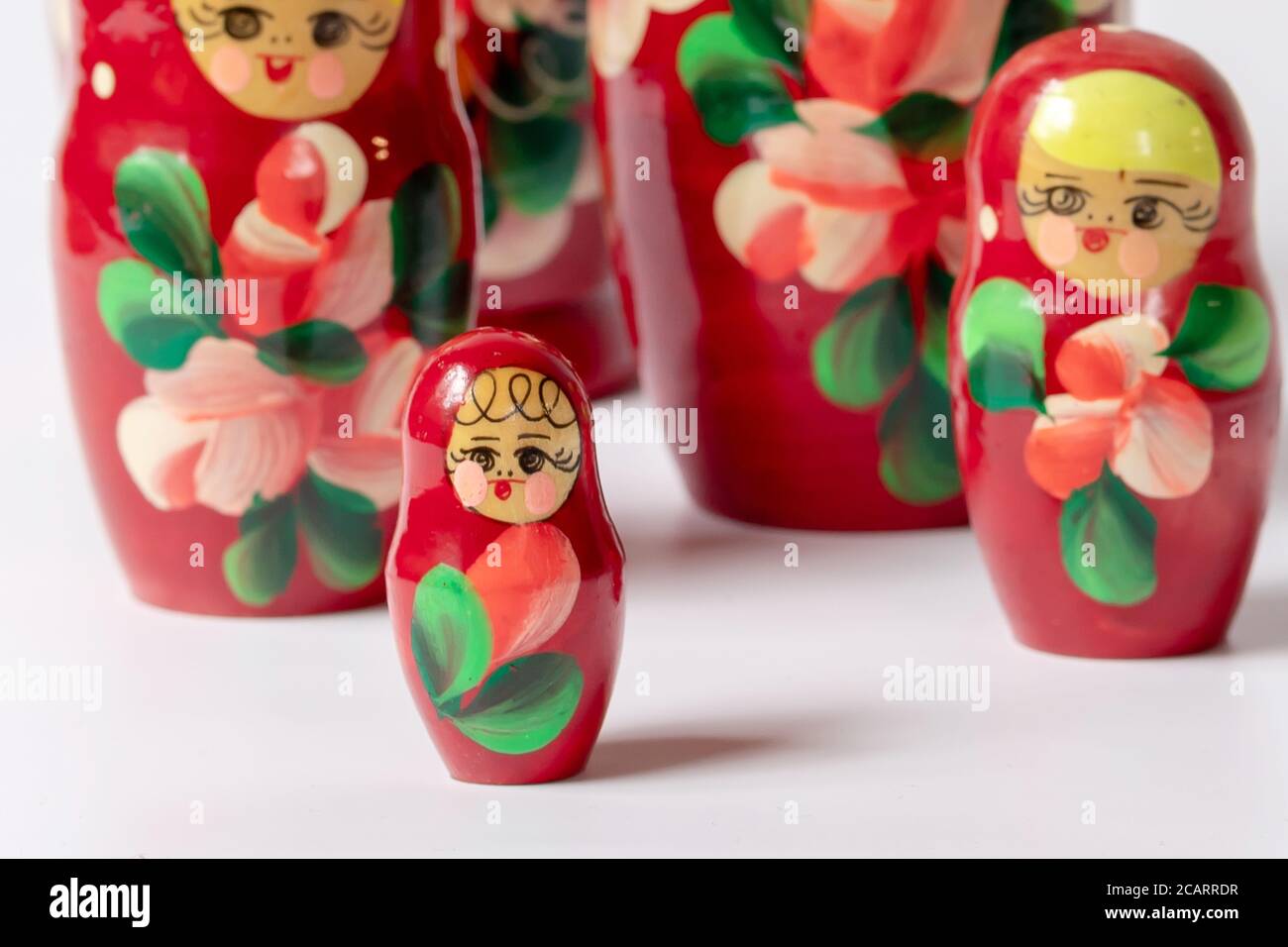 Russian folk wooden toy matryoshka, isolate on a white background. Folk ...