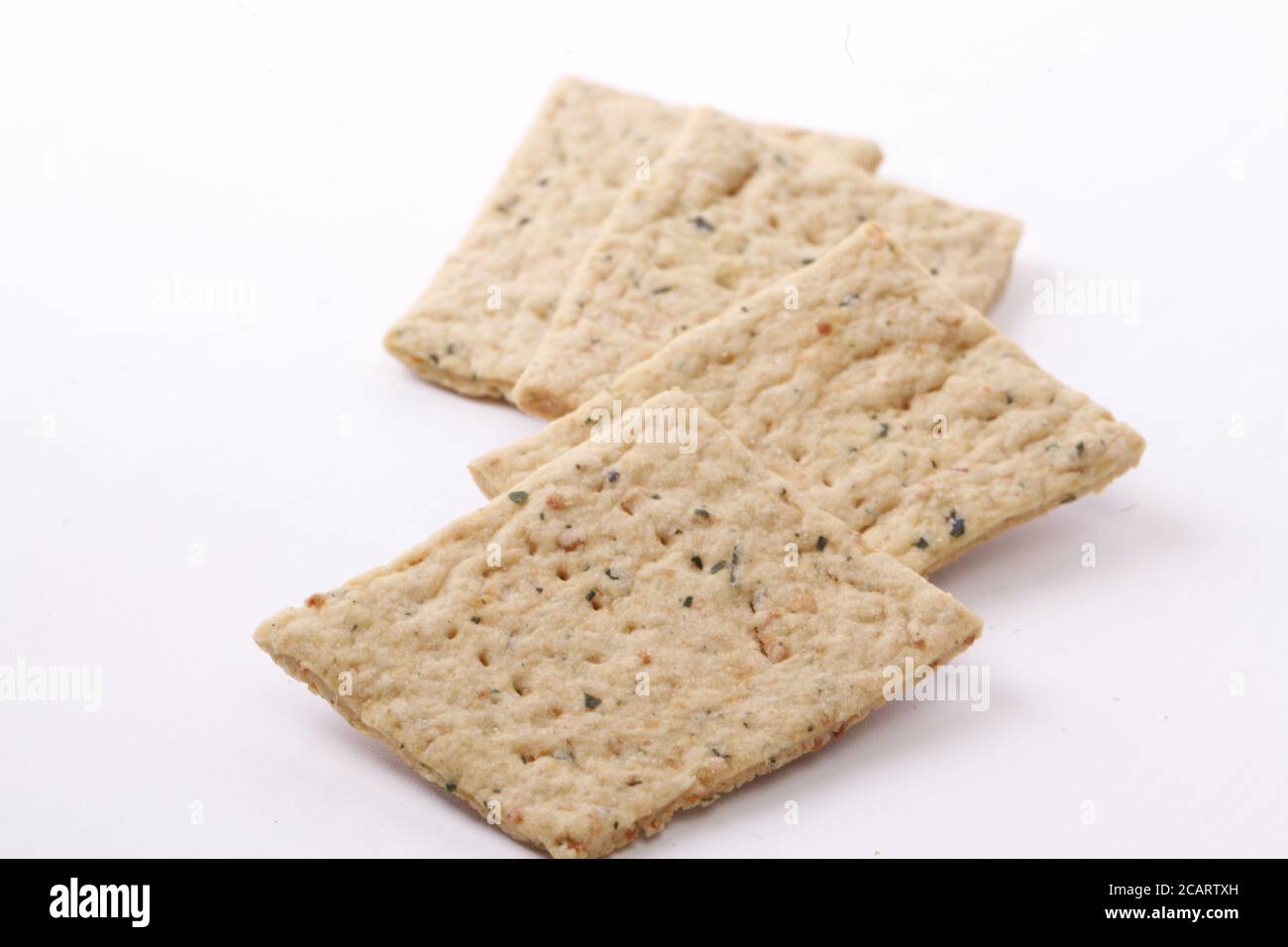 Dry thin lemon leaves crackers. Tasty crispy crackers isolated on white ...