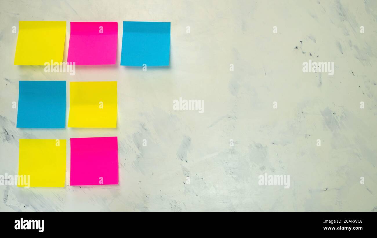 Set of several blank colorful post-it notes with copy space for text on ...