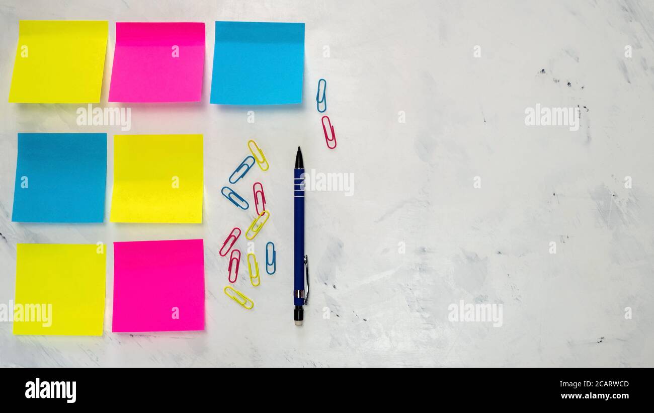 Set of several blank colorful post-it notes with copy space for text on ...