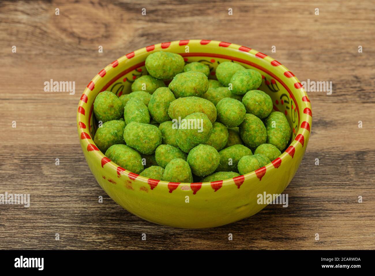 Spicy wasabi peanuts snack in the bowl Stock Photo - Alamy