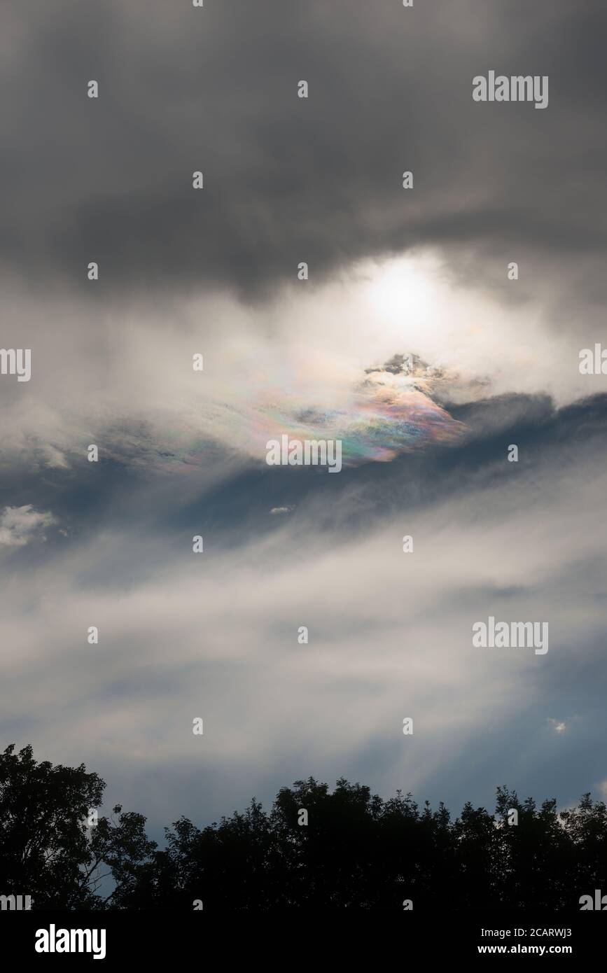 Solar halos an atmospheric optical phenomenon consisting of a bright ...