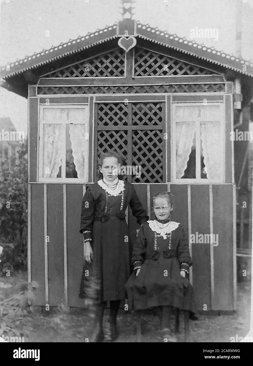 Girls outside house Black and White Stock Photos & Images - Alamy