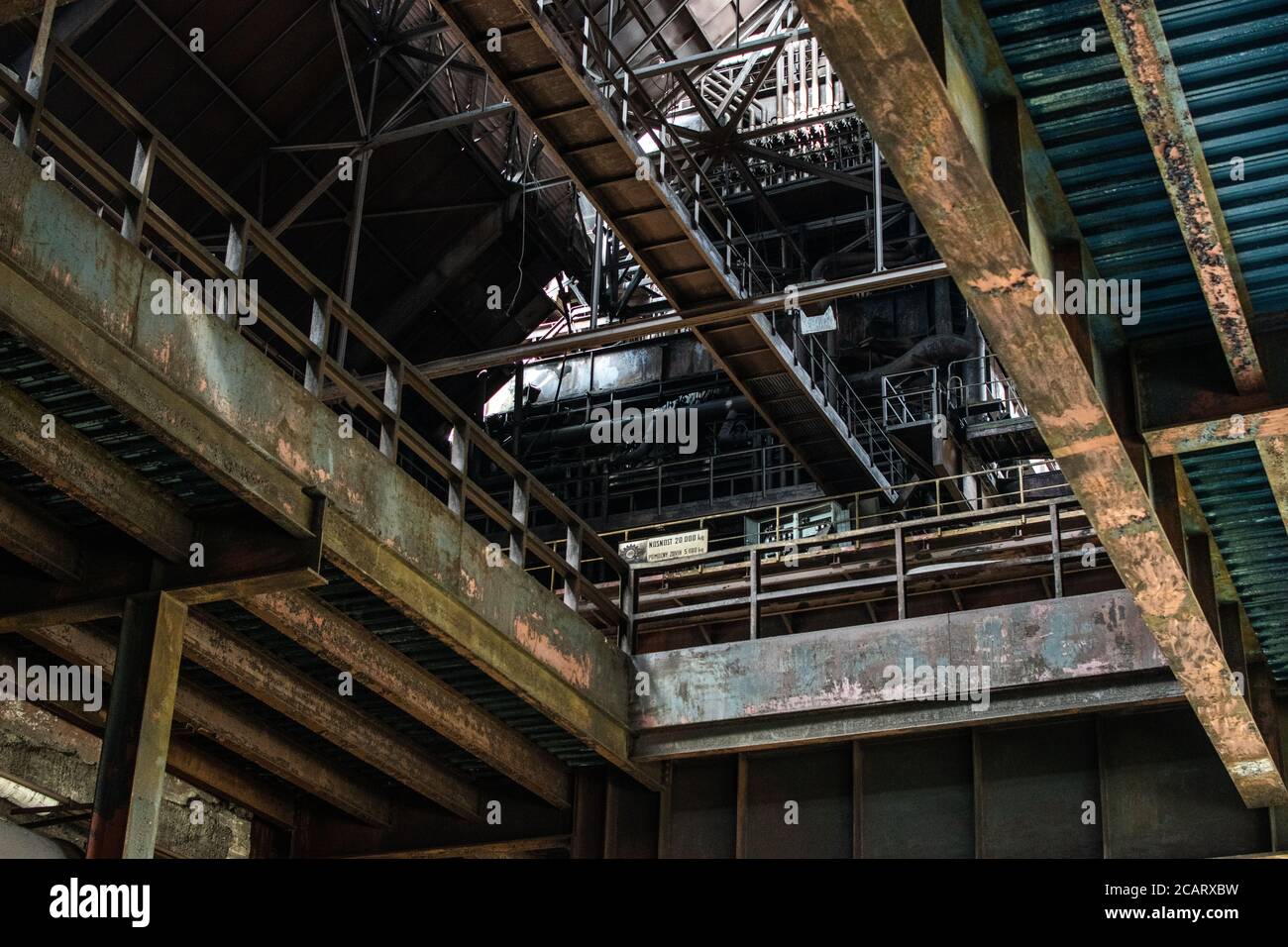 interior photo of a historic industrial metallurgy iron steel factory ...