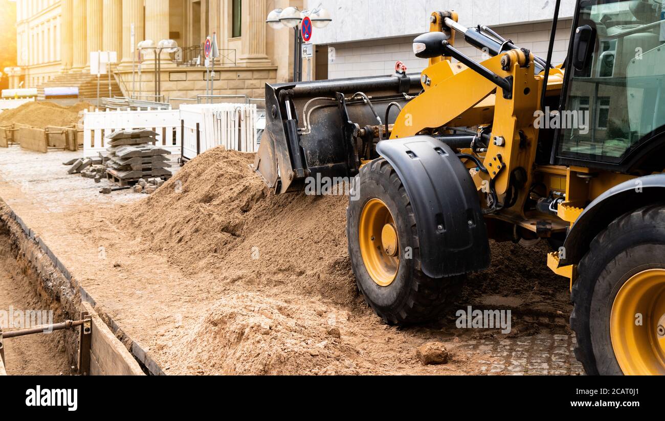 Yellow Construction bulldozer at work Stock Photo - Alamy